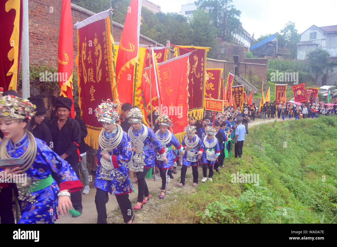 Chinese people of Dong ethnic group dressed in traditional costumes ...
