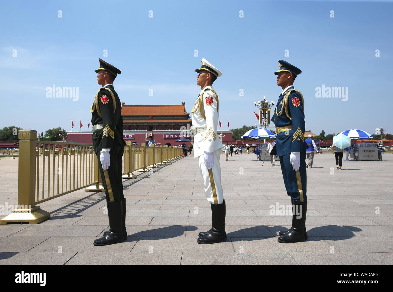 Chinese paramilitary policemen patrol the Tian'anmen Square on a ...