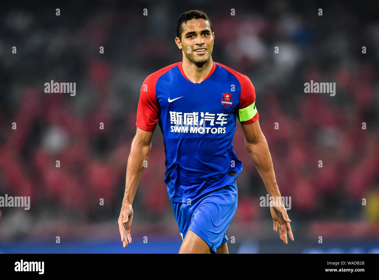 Brazilian football player Alan Kardec of Chongqing SWM celebrates after ...
