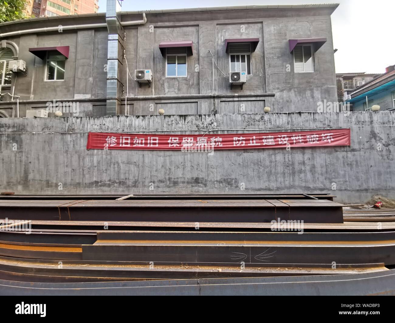 Chinese firefighters spray water to distinguish the fire after a fire ...