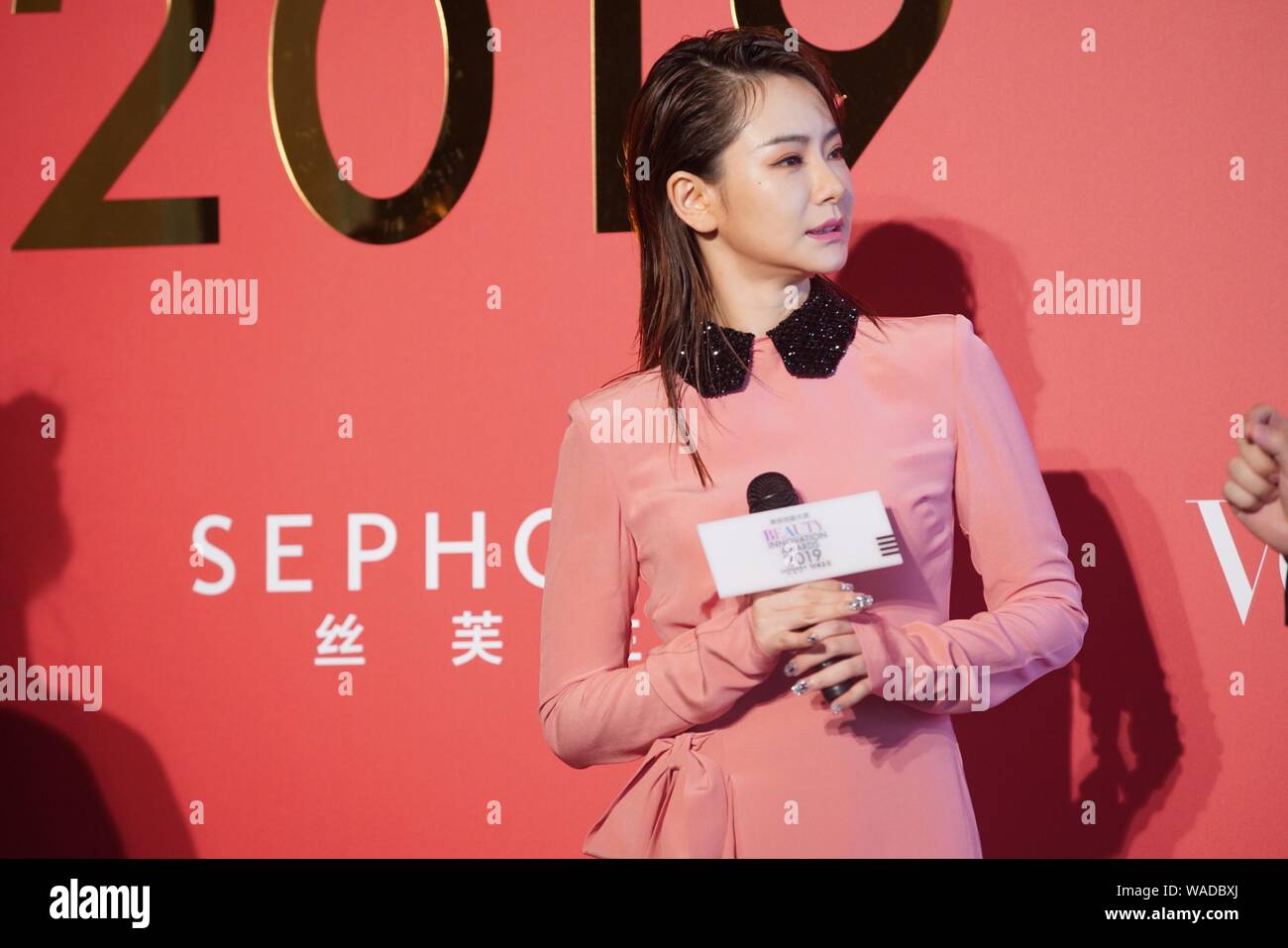 Chinese singer and actress Qi Wei, also known as Stephy Qi, poses ...