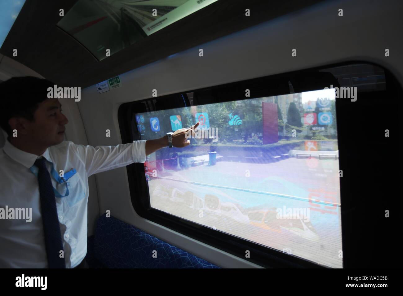 Visitors view a new generation carbon fiber metro car Visitors view a new generation carbon fiber metro car