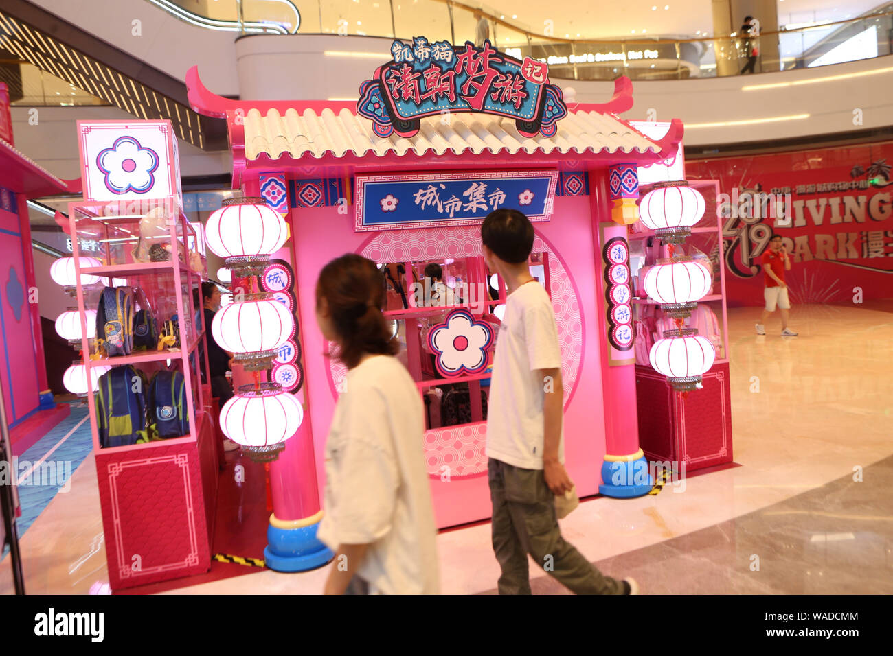 Cartoon characters from Hello Kitty dressed in traditional costumes of ...