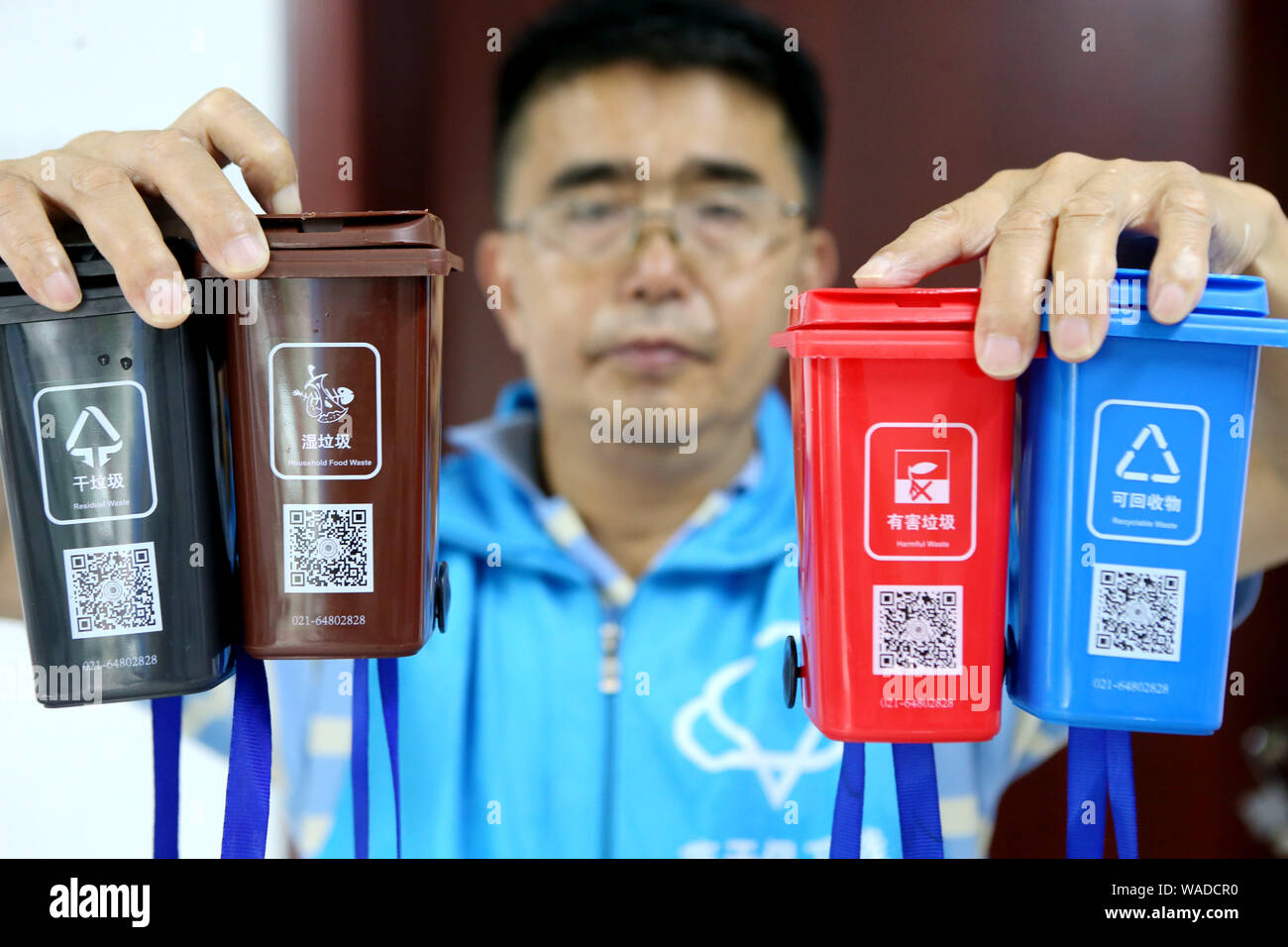 The man Niu Guangcheng from Gumei community's environment service ...