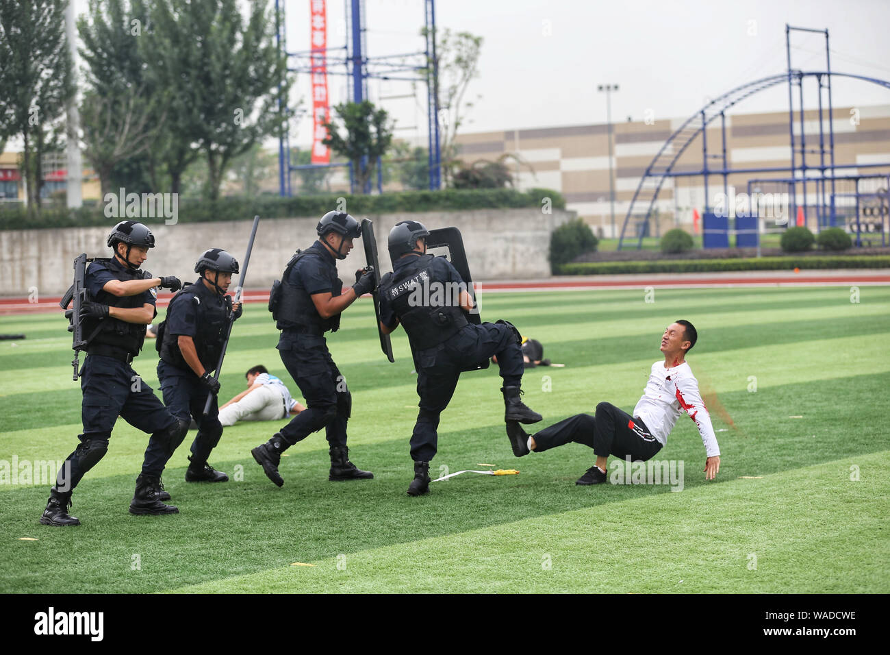 Chinese police officers, including SWAT police officers, take part in a ...