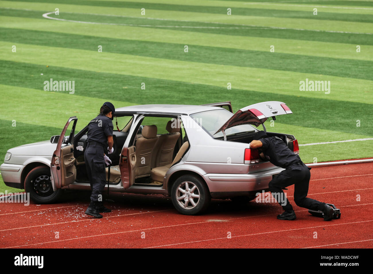 Chinese police officers, including SWAT police officers, take part in a ...