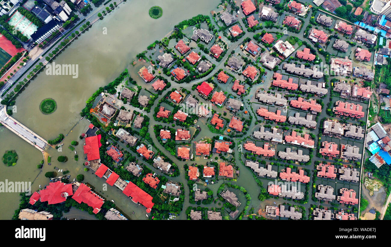 Aerial view of buidings overwhelmed by flood caused by heavy rain in ...