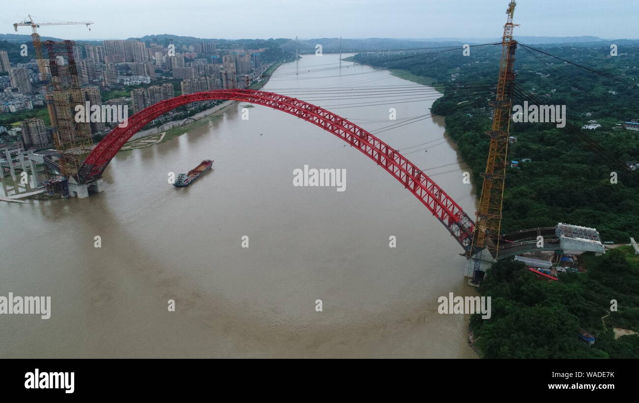 In this aerial view, the closure of main arch of Hejiang Yangtze River ...