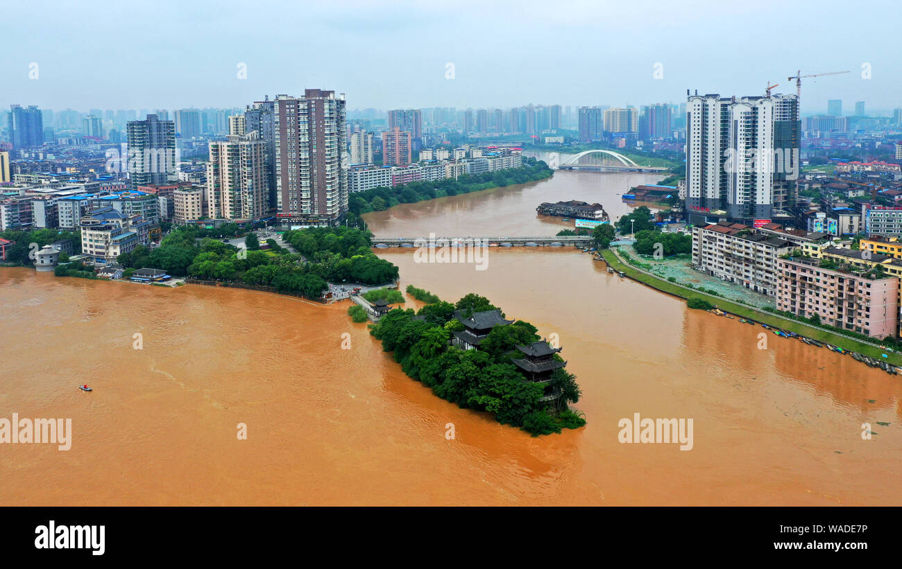 Aerial view of buidings overwhelmed by flood caused by heavy rain in ...