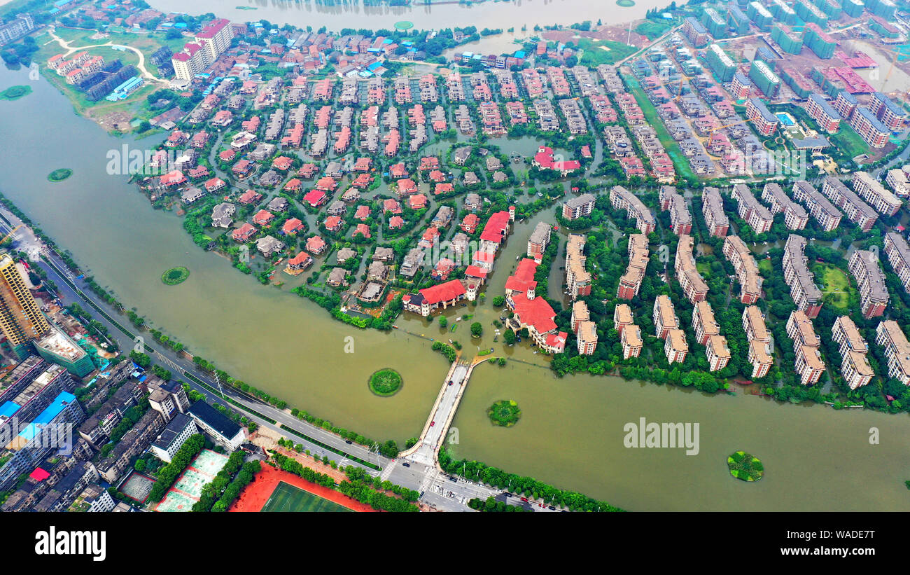 Aerial view of buidings overwhelmed by flood caused by heavy rain in ...
