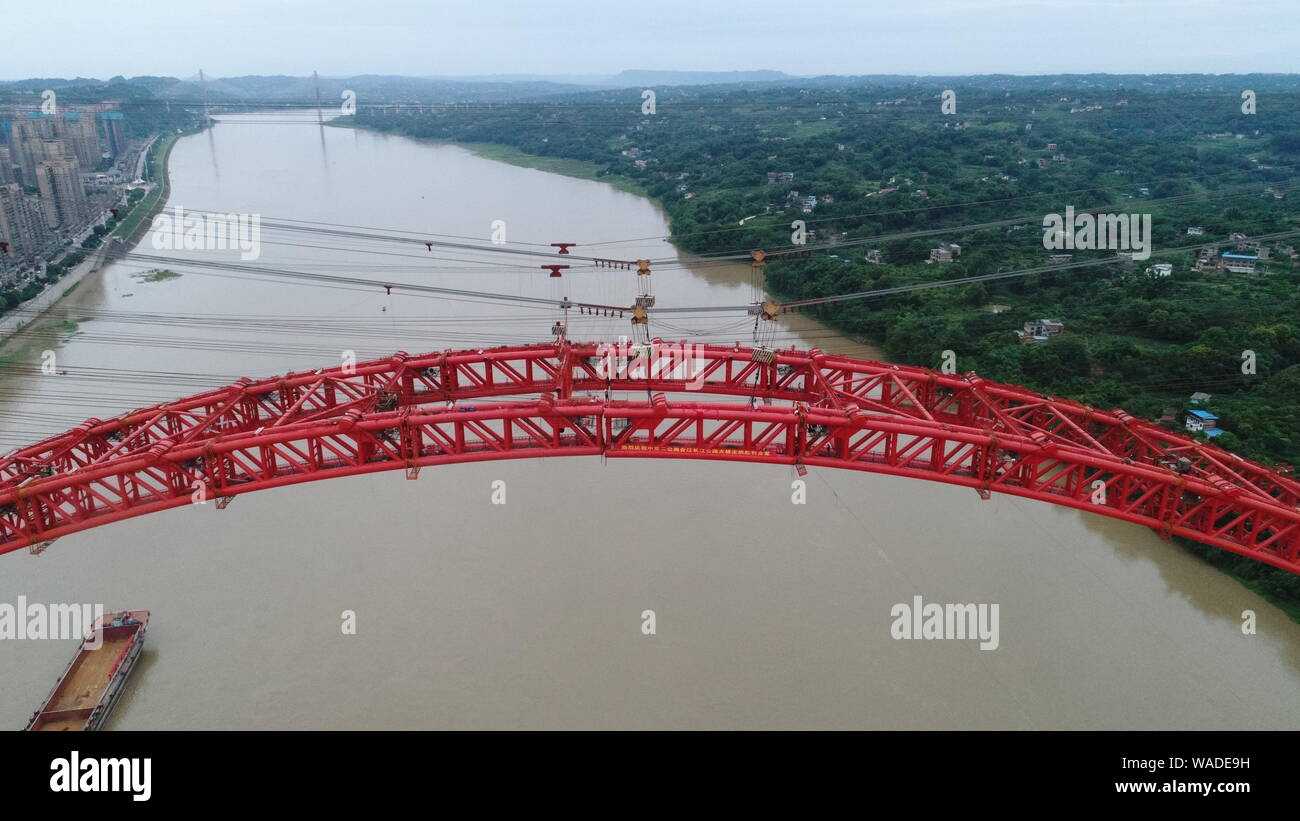 In this aerial view, the closure of main arch of Hejiang Yangtze River ...