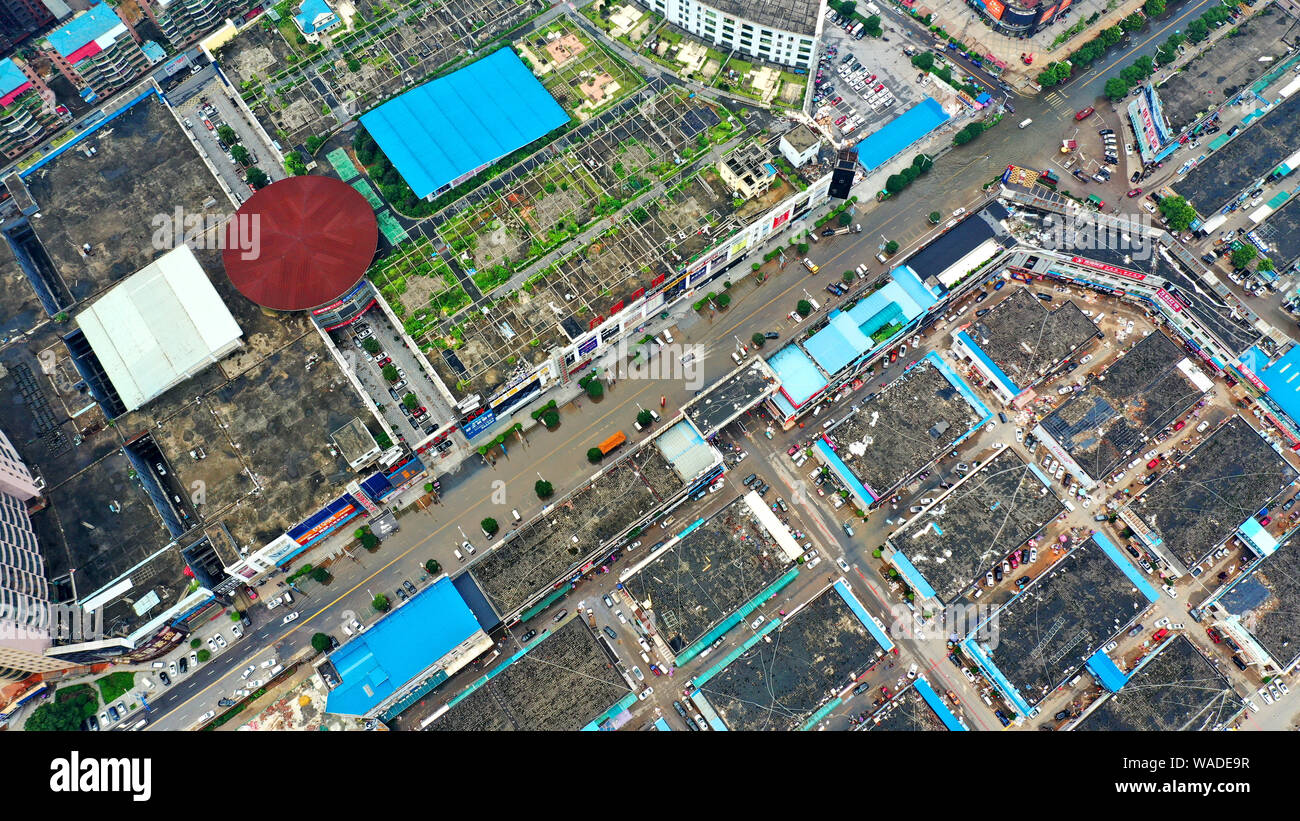 Aerial view of buidings overwhelmed by flood caused by heavy rain in ...