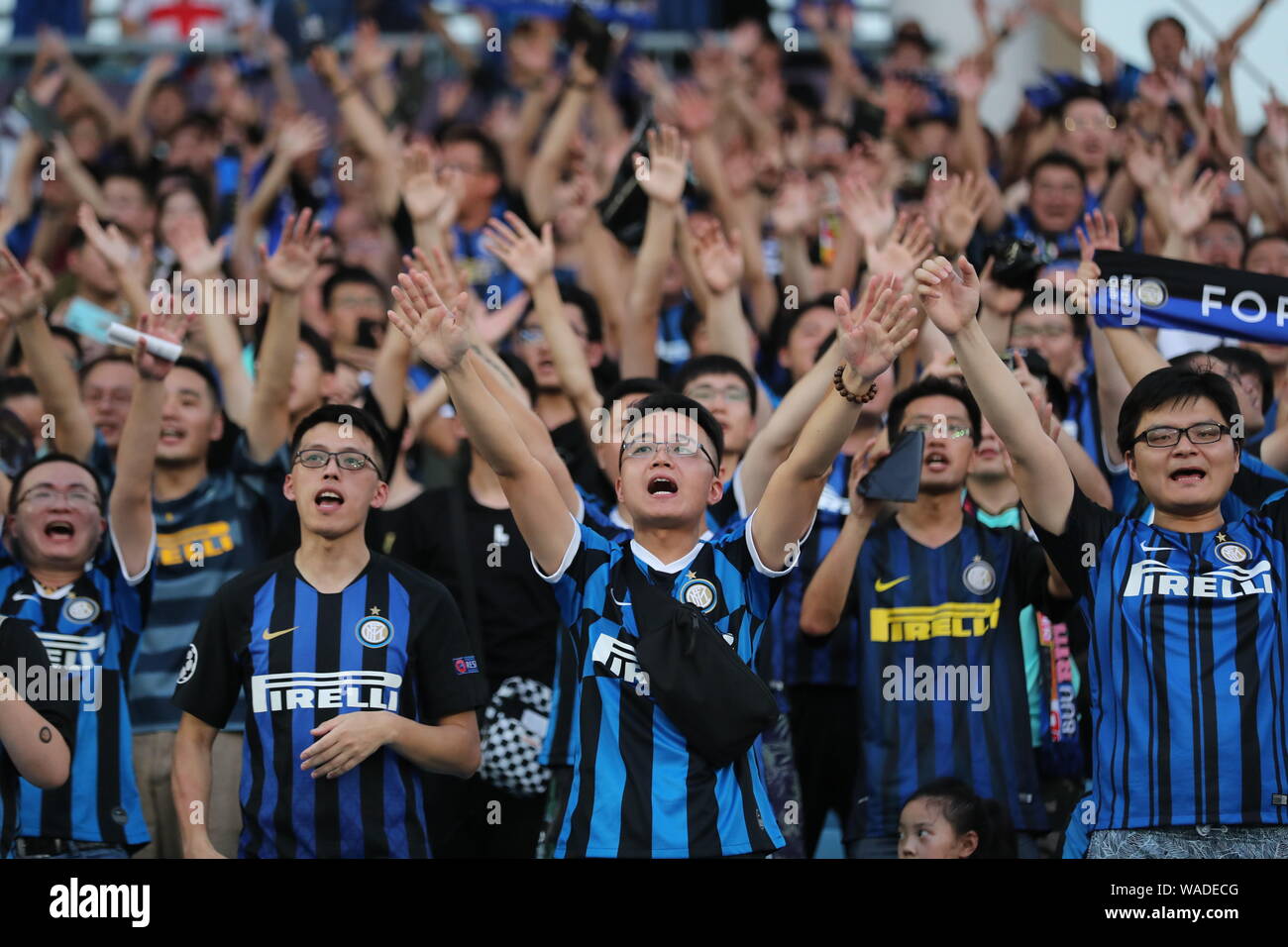 Fans shout and wave slogans to show support to Inter Milan during the ...