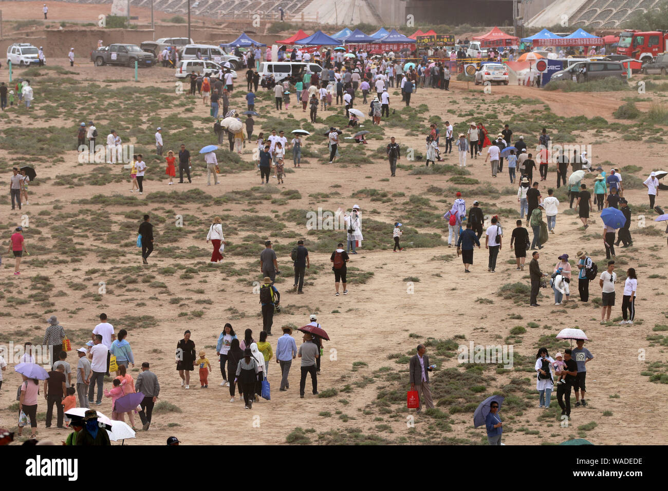 Local residents and tourists watche racing cars competing in the 2019 ...
