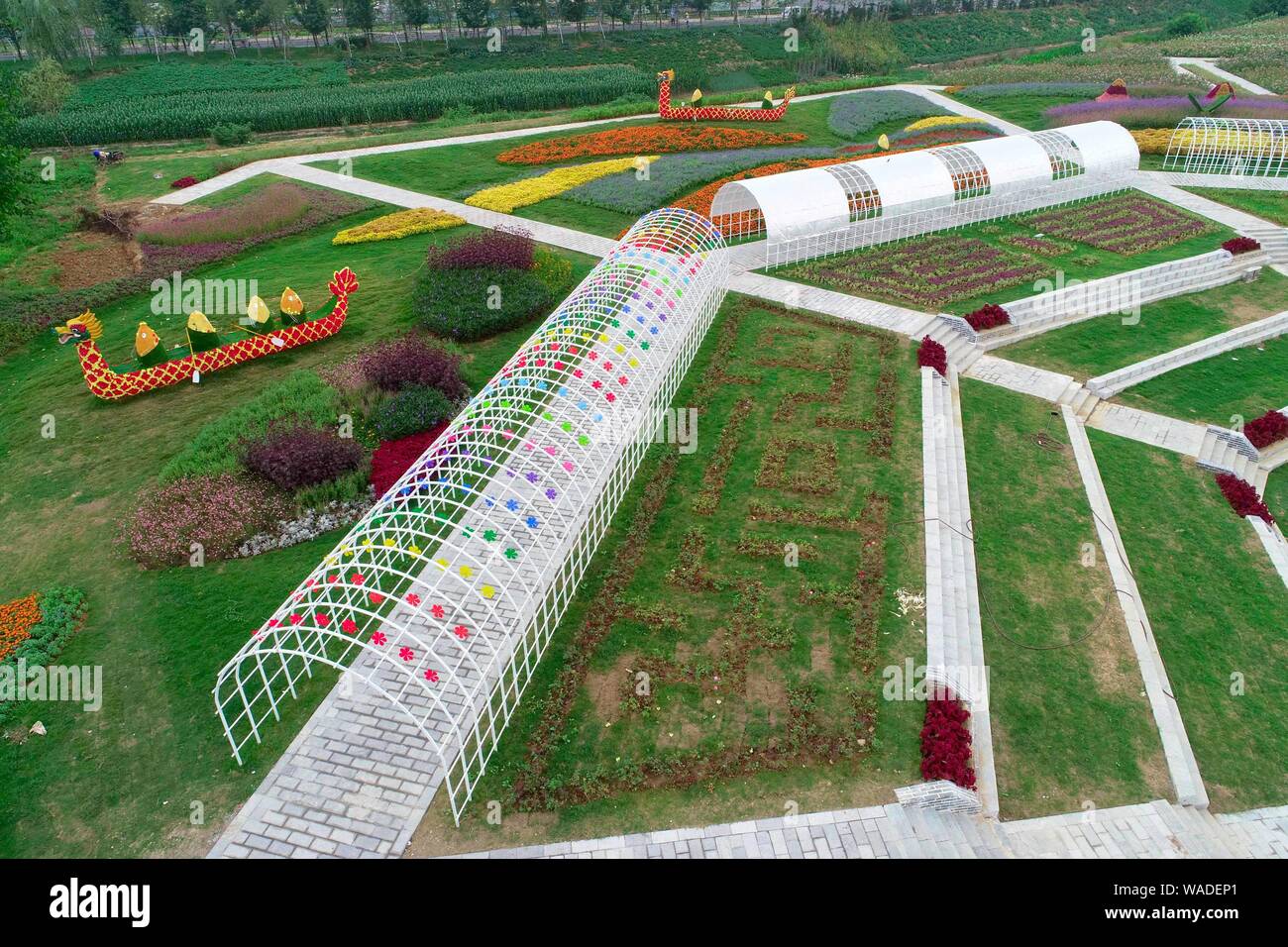 Aerial view of colorful plants featuring the shape of bagua diagram at ...