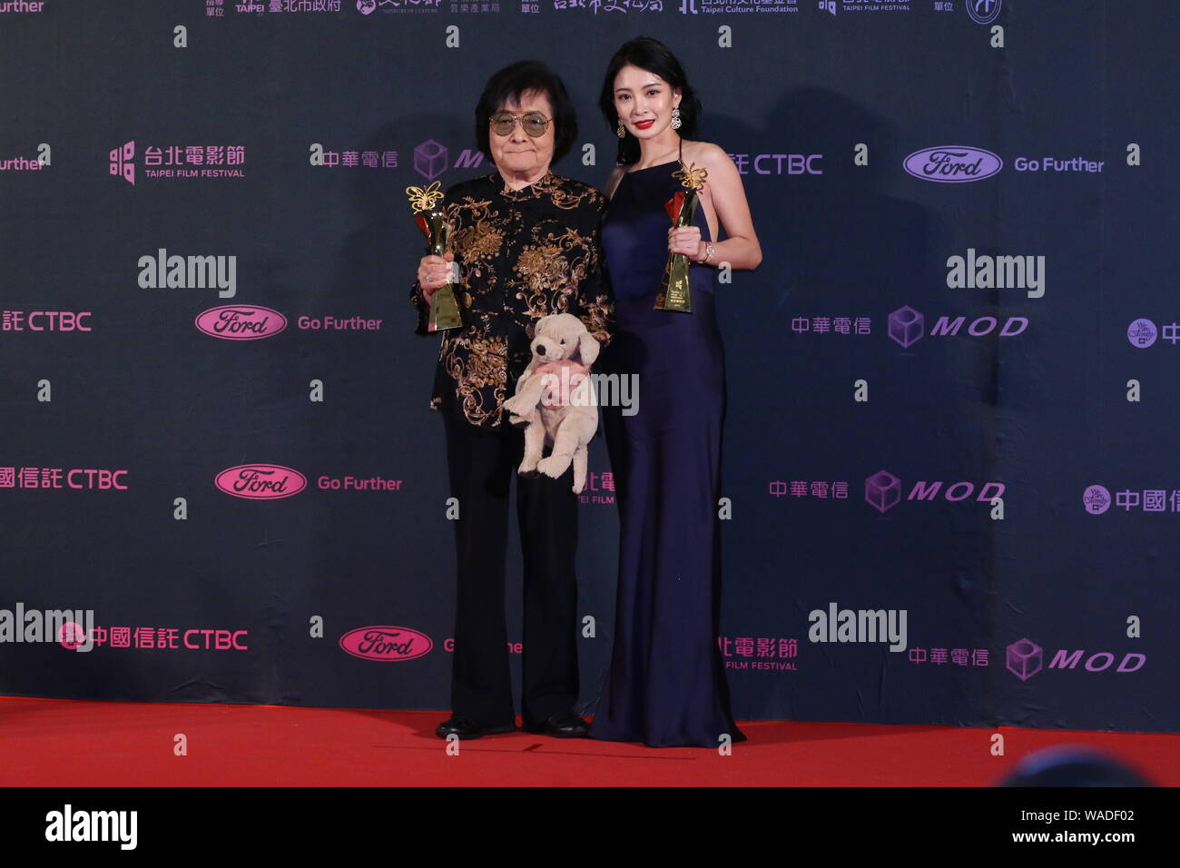Taiwanese actresses Yin-Shang, left, and Li Yi-jie pose with their ...
