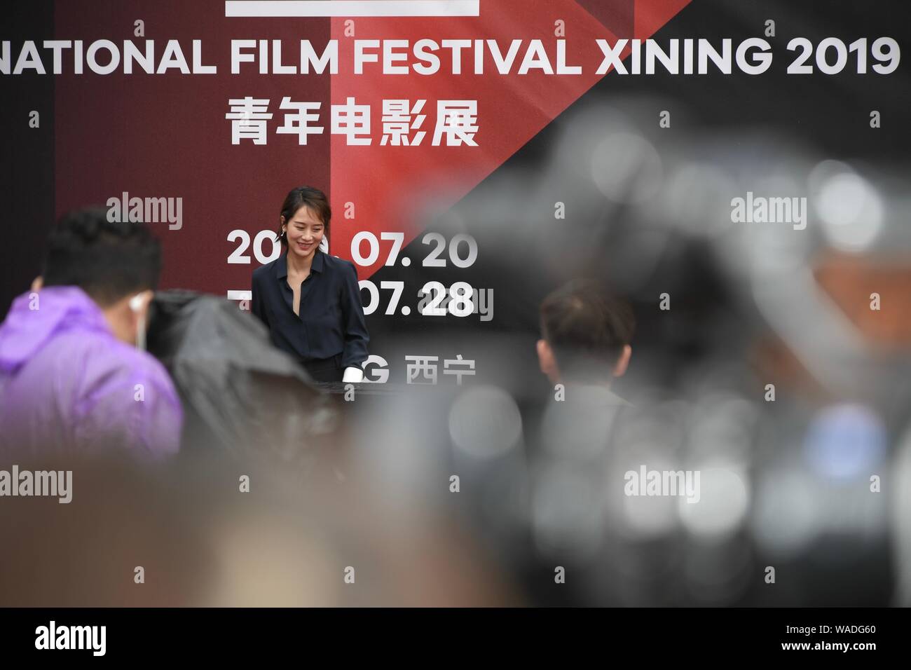 Chinese actress Hai Qing poses as she arrives on the red carpet for the ...