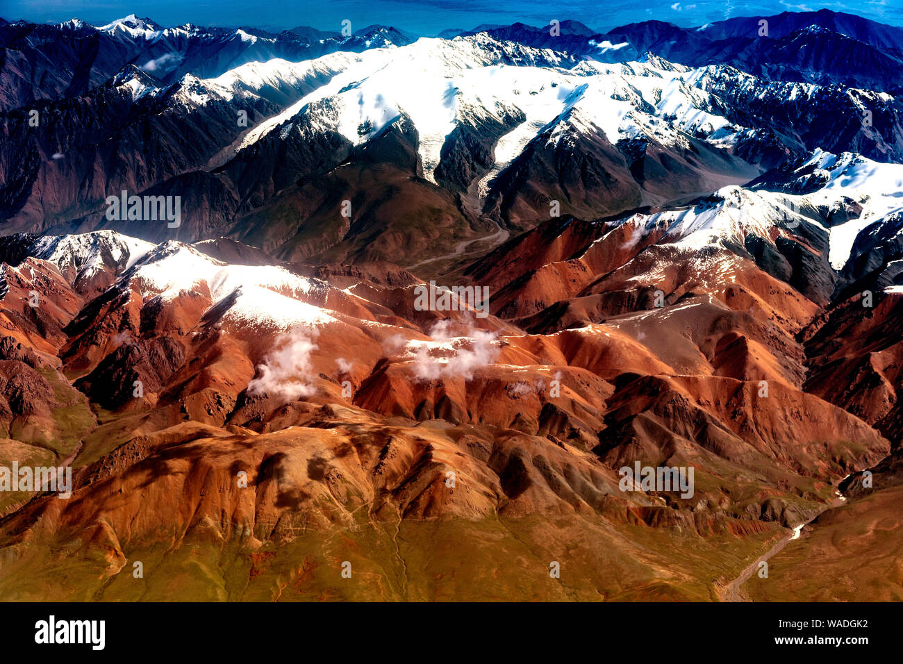 Aerial views of snow mountains in Xinjiang, the largest province in ...