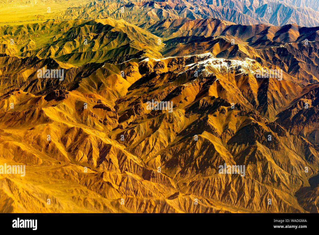 Aerial views of snow mountains in Xinjiang, the largest province in ...