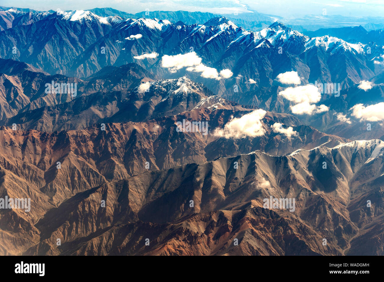 Aerial views of snow mountains in Xinjiang, the largest province in ...