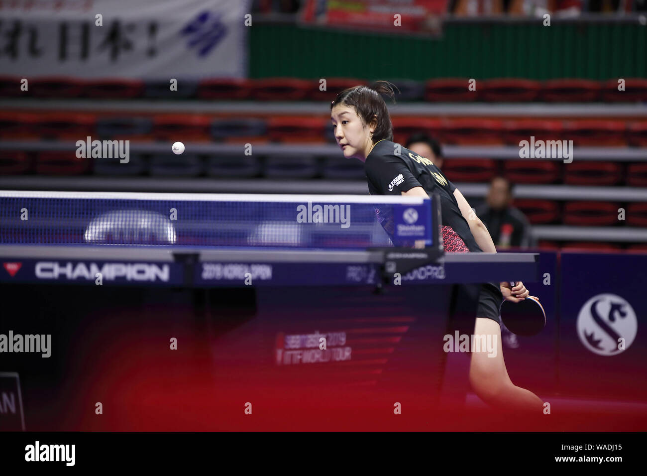 Chen Meng of China returns a shot to Honami Nakamori of Japan in the ...