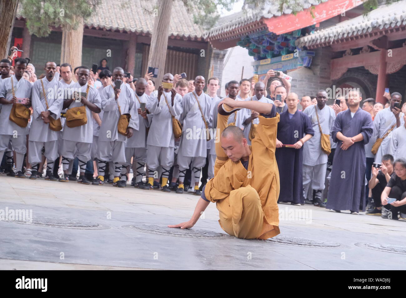 Shaolin apprentice demonstrates Chinese Kungfu during the opening ...