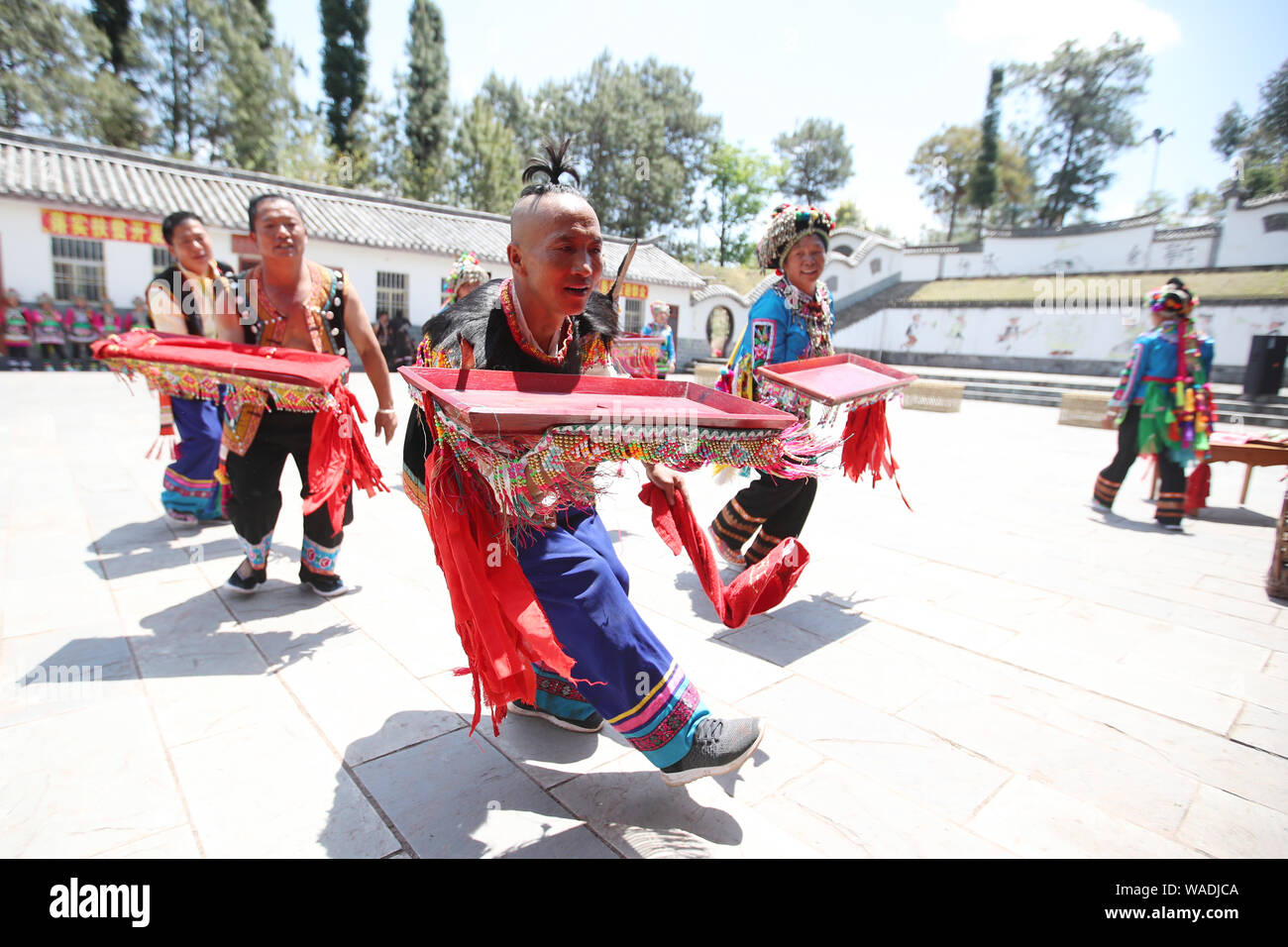 Yi People sing and dance during intangible cultural heritage ...