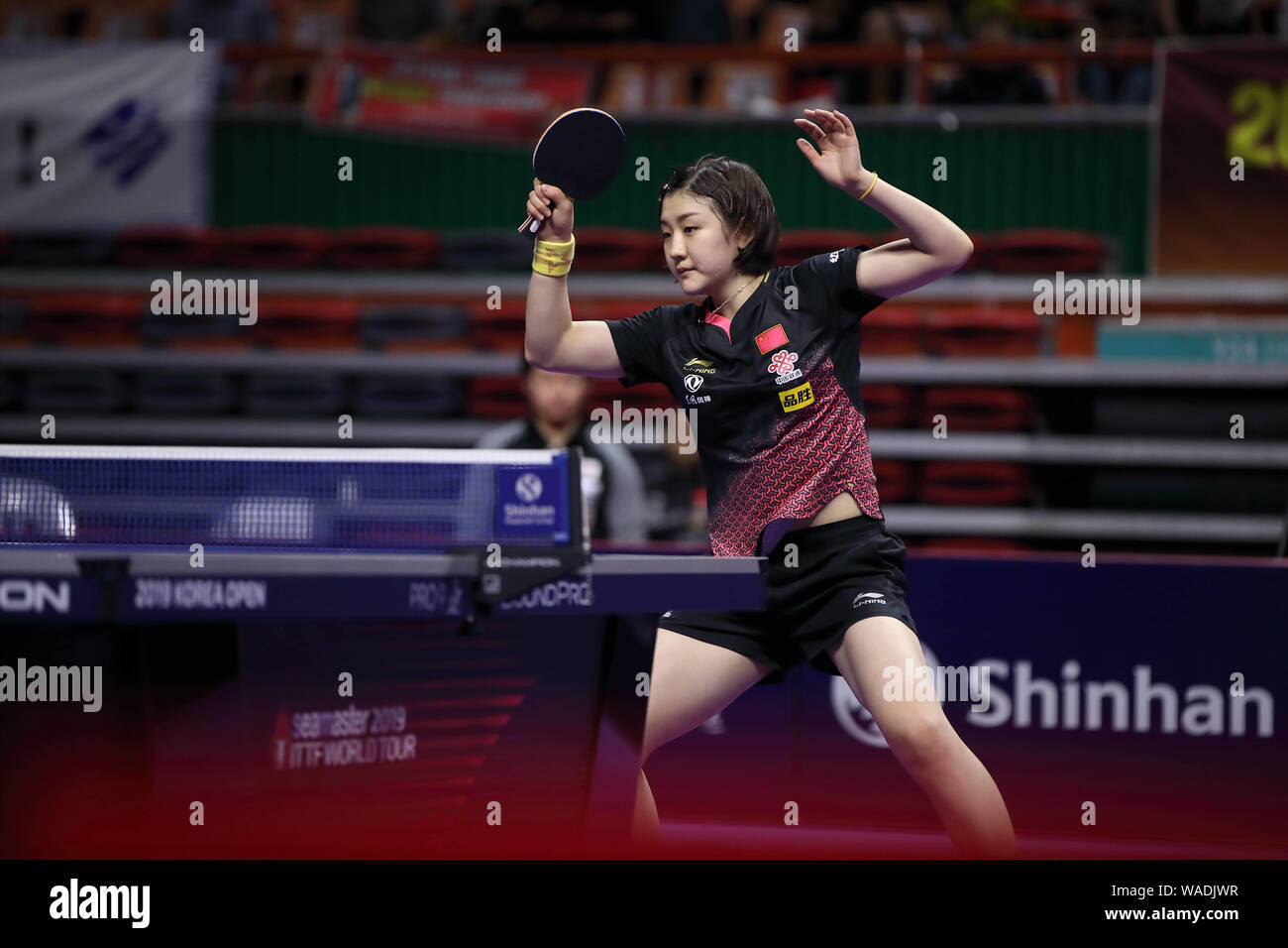 Chen Meng of China returns a shot to Honami Nakamori of Japan in the ...