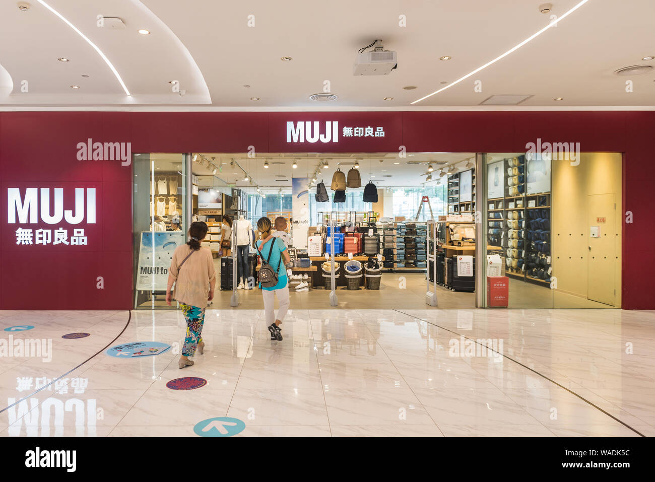 --FILE--Customers enter a store of Muji in Wuhan city, central China's ...