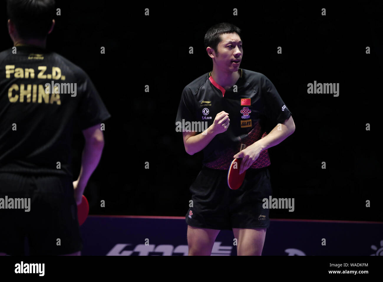 Xu Xin of China celebrates after scoring against Jeoung Youngsik and ...
