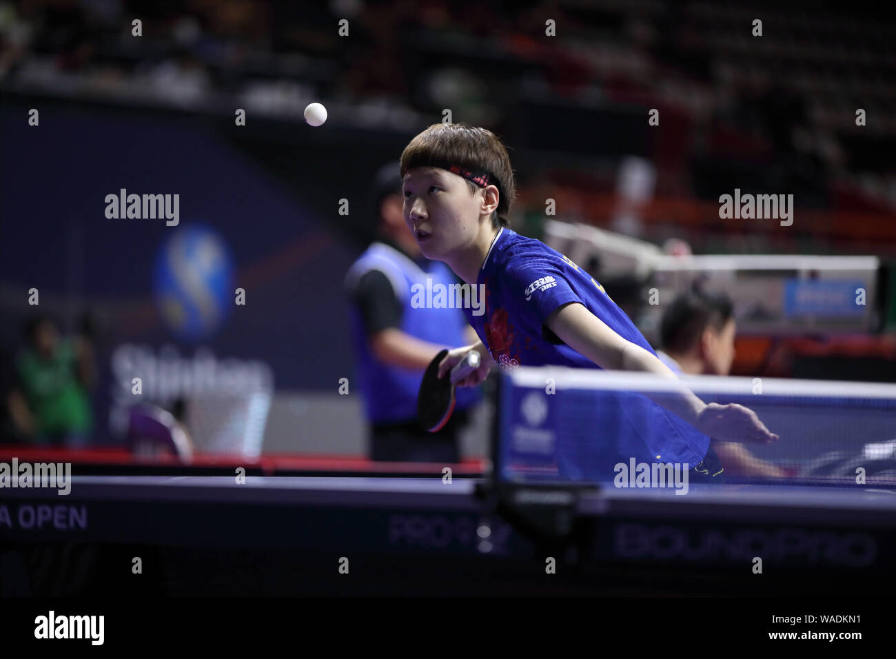 Wang Manyu of China returns a shot to Miyu Nagasaki of Japan in the ...