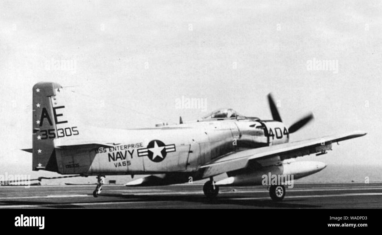 Douglas A-1H Skyraider of VA-65 lands on USS Enterprise (CVAN-65), in ...