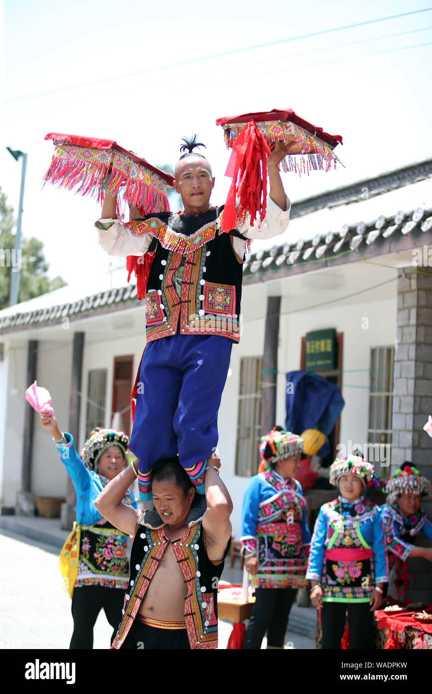 Yi People sing and dance during intangible cultural heritage ...