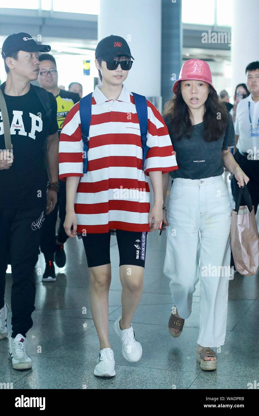 Chinese singer Chris Lee or Li Yuchun arrives at the Beijing Capital ...