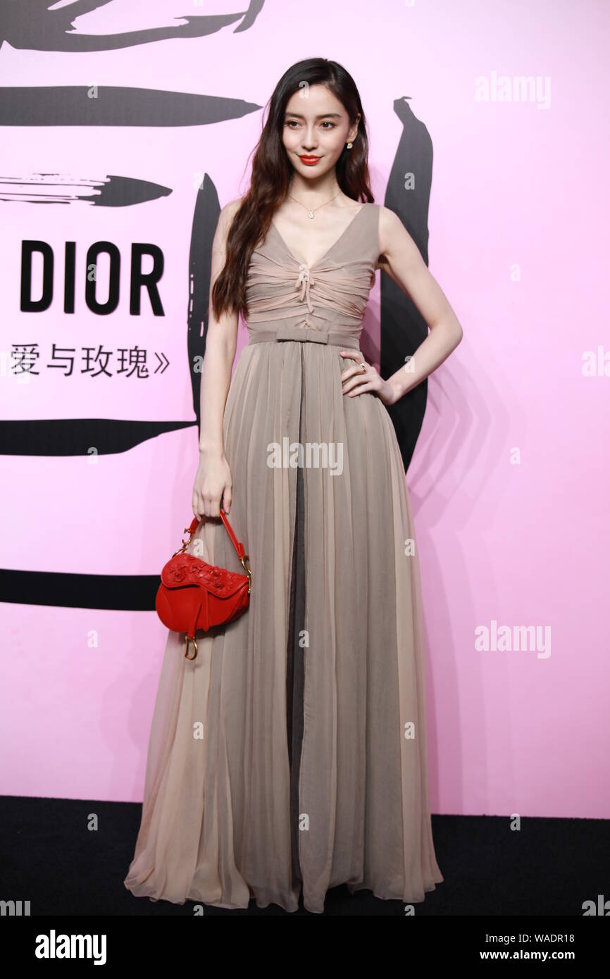 Hong Kong model and actress Angelababy arrives for an opening event of ...