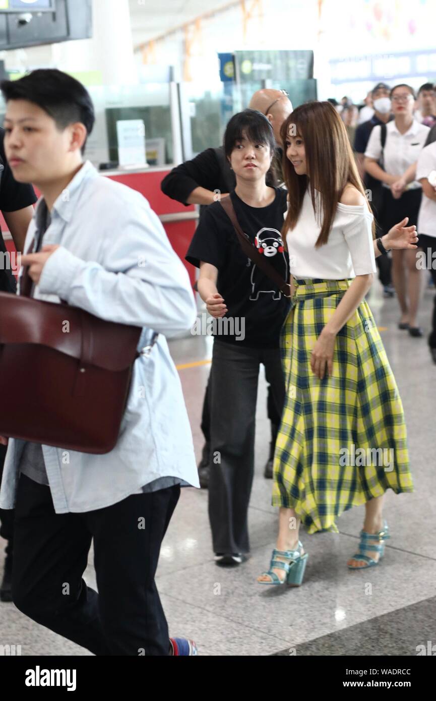 Japanese singer Mai Kuraki arrives at the Beijing Capital International ...