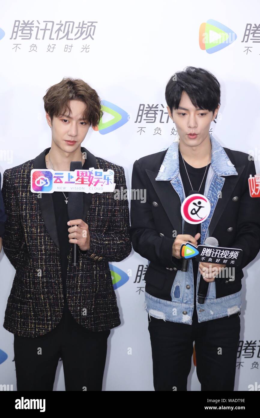 Chinese actors and singers Wang Yibo, left, of South Korean-Chinese ...