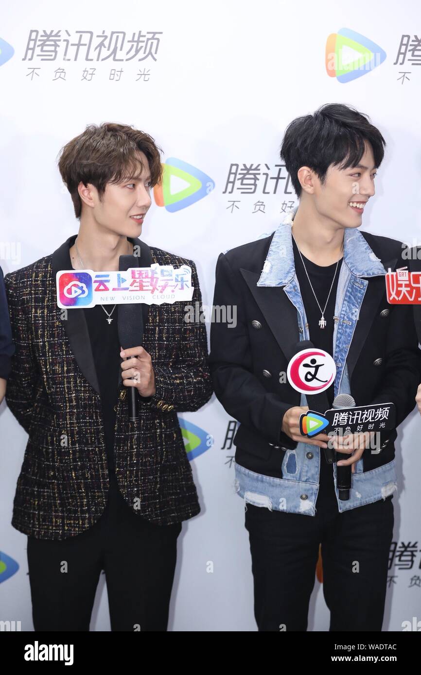 Chinese actors and singers Wang Yibo, left, of South Korean-Chinese ...