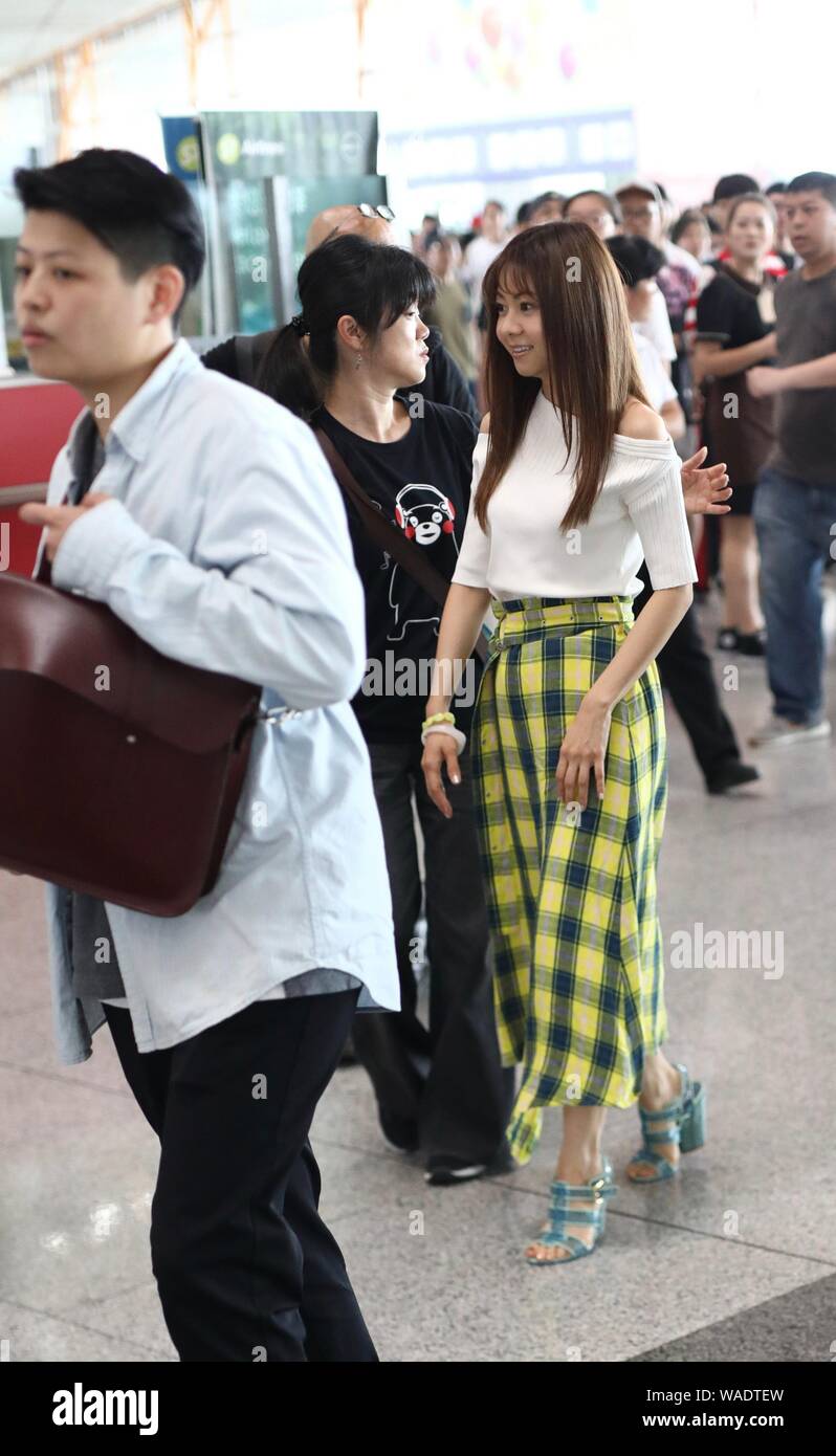 Japanese singer Mai Kuraki arrives at the Beijing Capital International ...