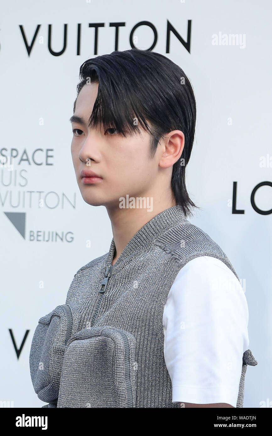 Chinese rapper and singer Zhou Zhennan of idol boy band R1SE attends a ...
