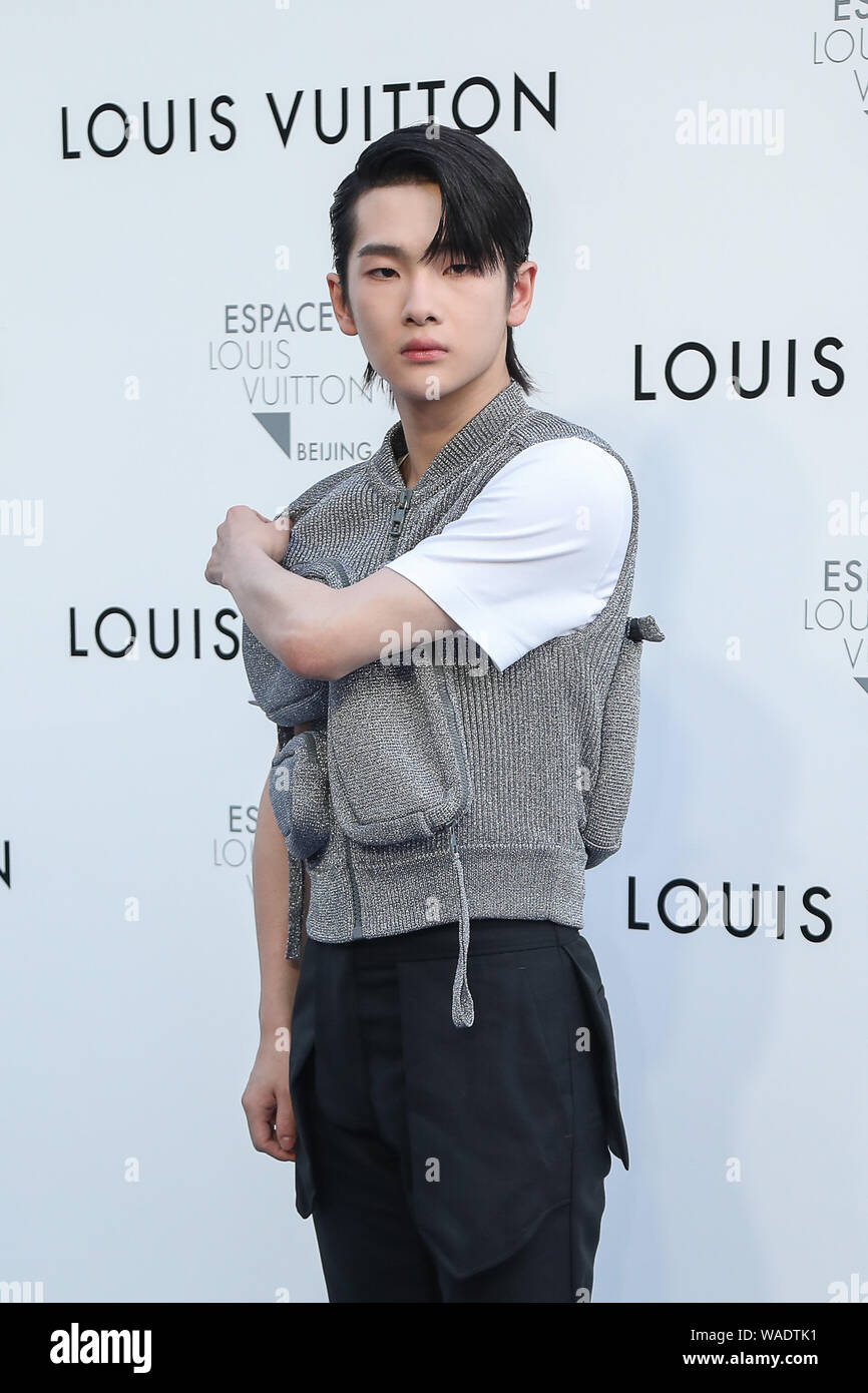 Chinese rapper and singer Zhou Zhennan of idol boy band R1SE attends a prmotional event for ...