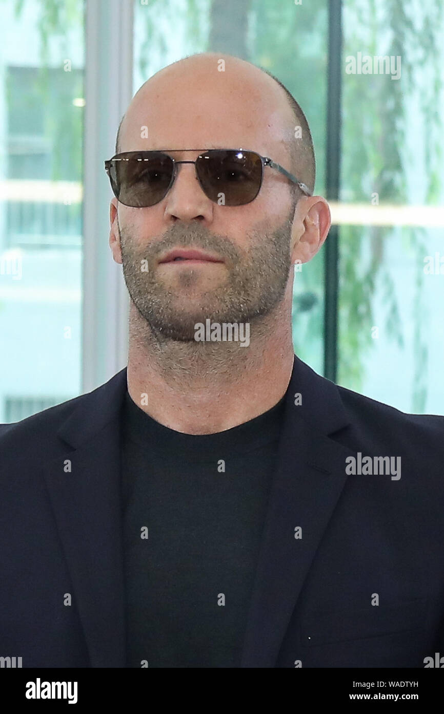 English actor Jason Statham arrives as he visits a dealership store of ...