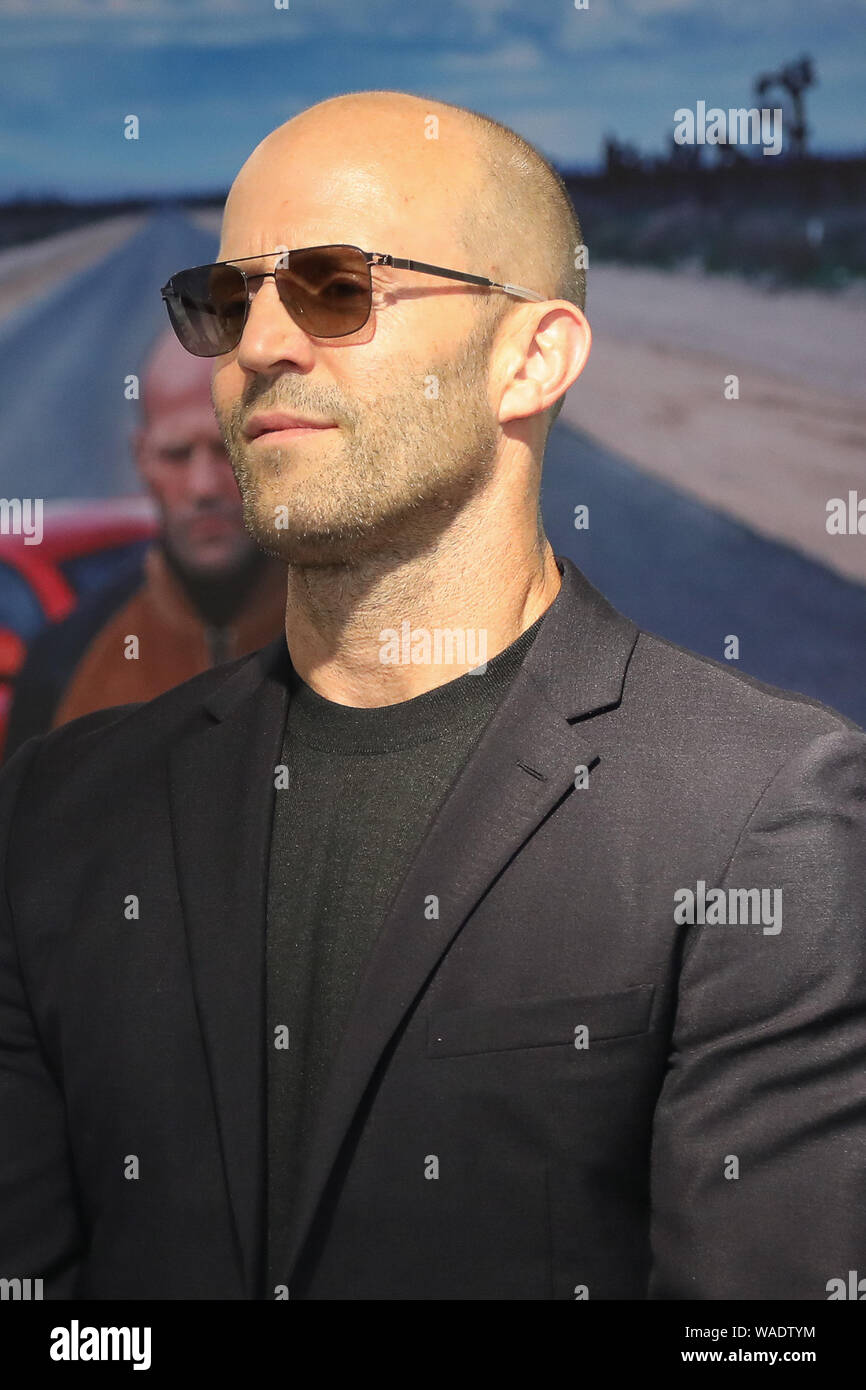English actor Jason Statham arrives as he visits a dealership store of ...