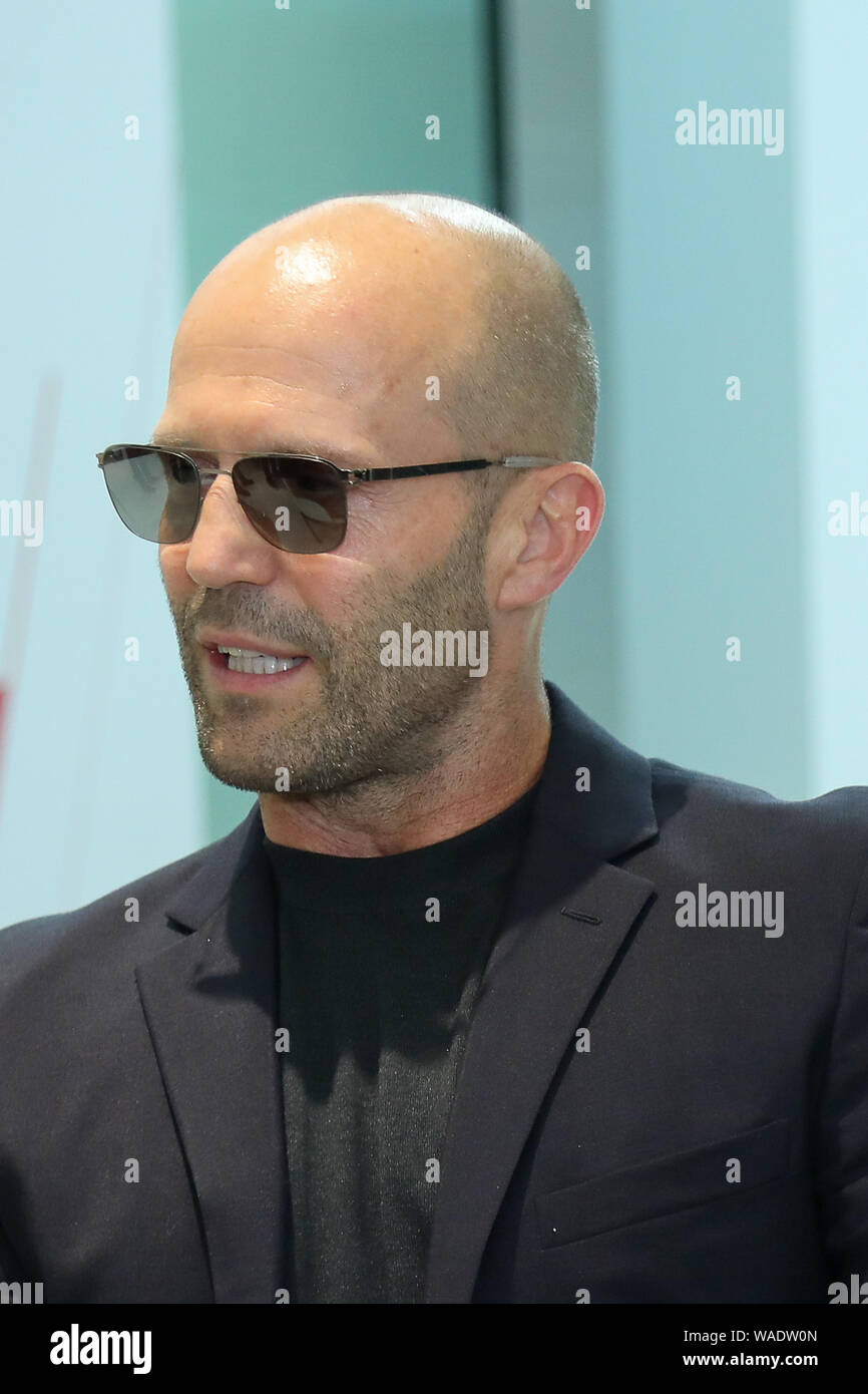 English actor Jason Statham arrives as he visits a dealership store of ...