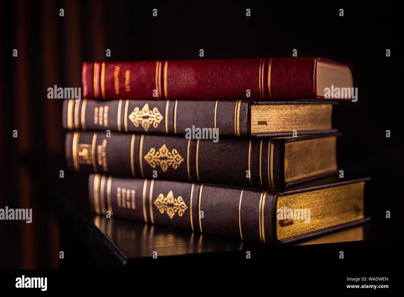 Old books stacked on antique hi-res stock photography and images - Alamy