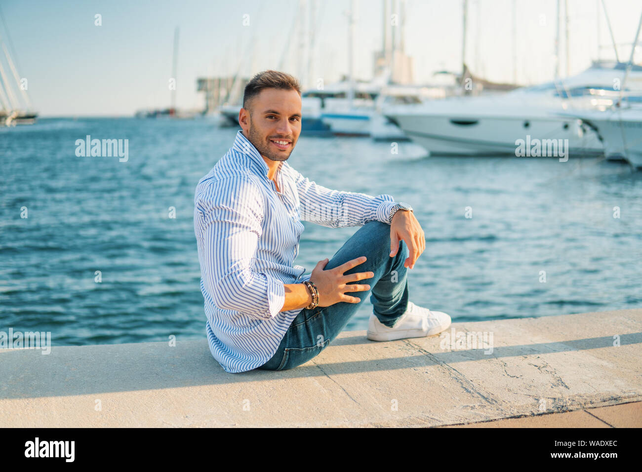Young rich man at Yacht Club. Businessman is Relaxing Stock Photo - Alamy