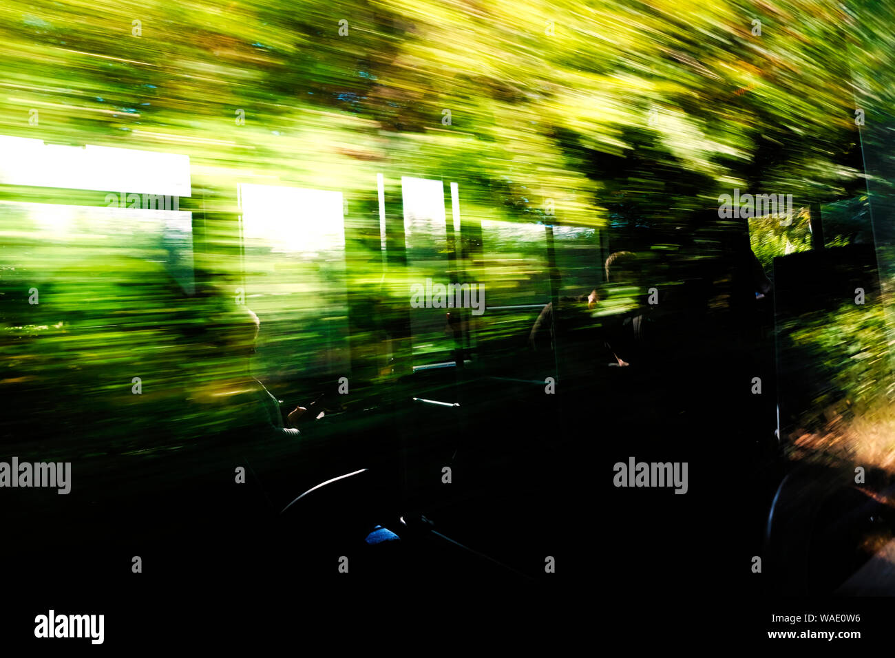 Bus travel movement passenger window reflections Stock Photo - Alamy