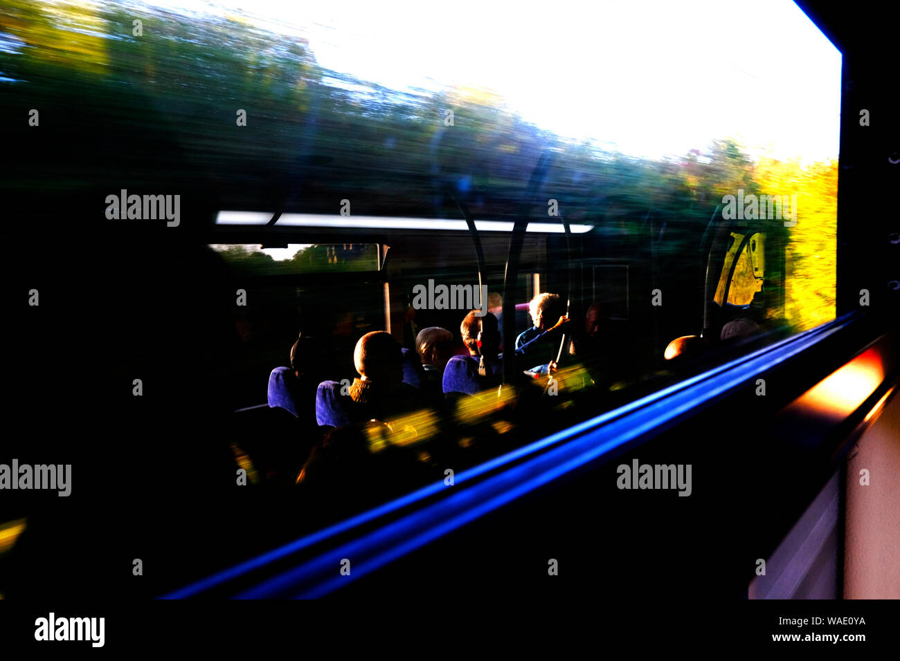 Bus travel movement passenger window reflections Stock Photo - Alamy