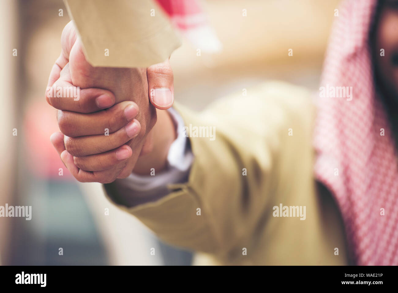 Arab man Teamwork Shake Hands Partnership Concept Stock Photo - Alamy