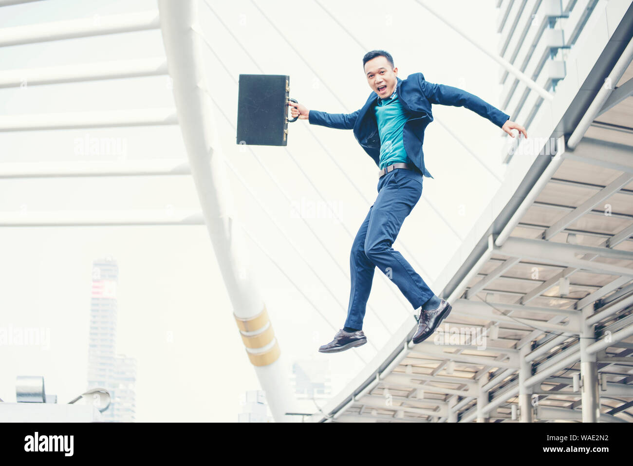 Success Business man jumping Stock Photo - Alamy